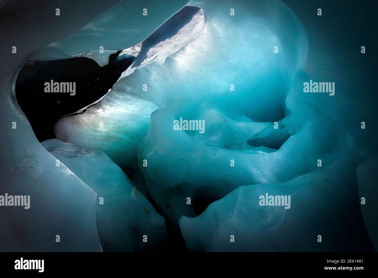 holes, faults and cracks of ice inside a mountain glacier background ...
