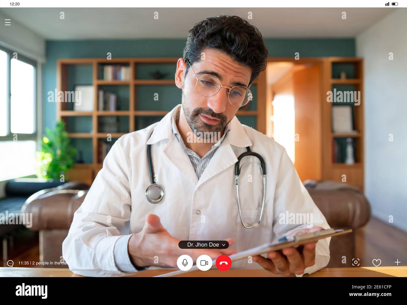 Doctor on a video call with a patient Stock Photo - Alamy