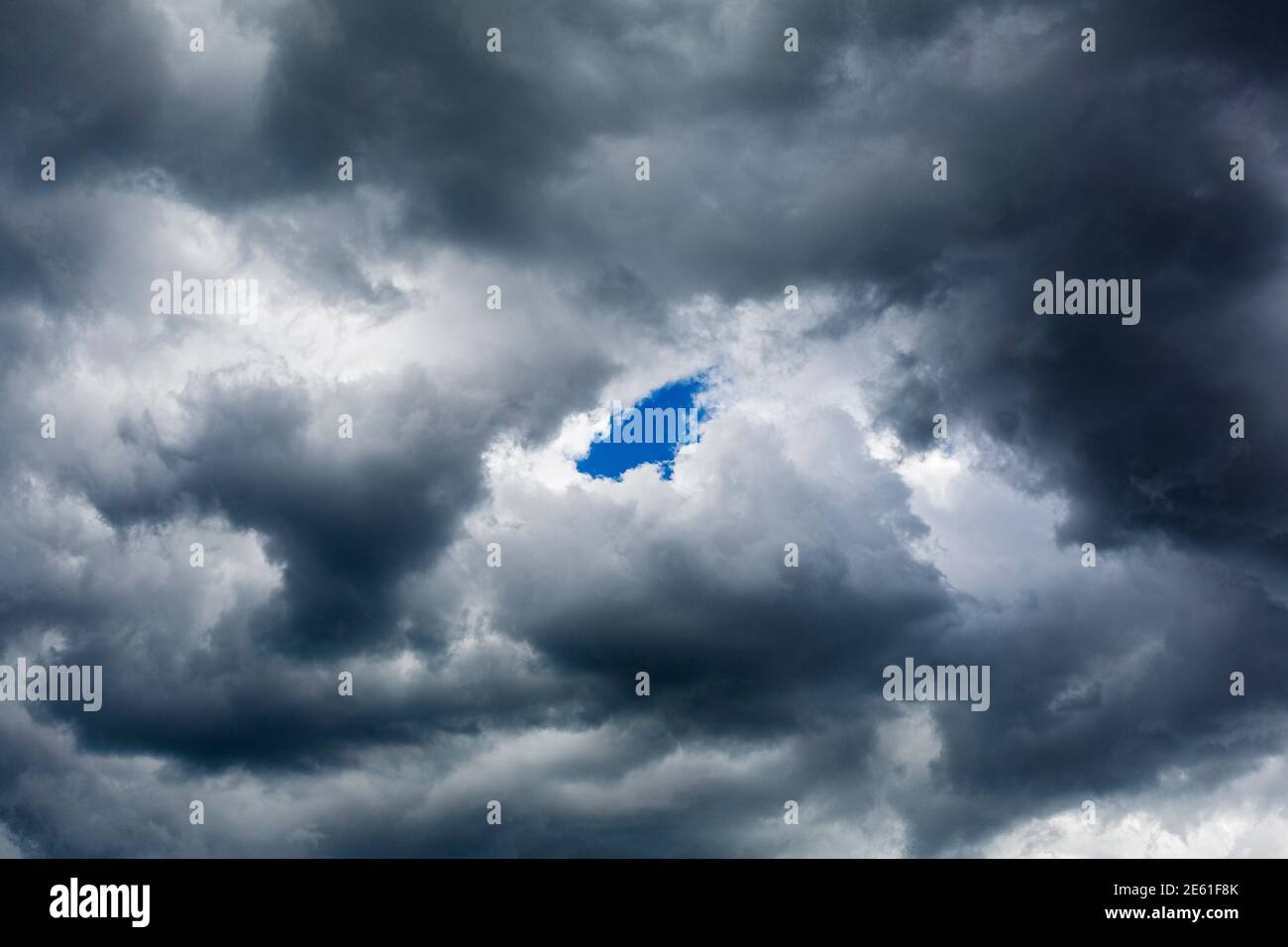 Grey cloudscape gathered in sky hi-res stock photography and images - Alamy