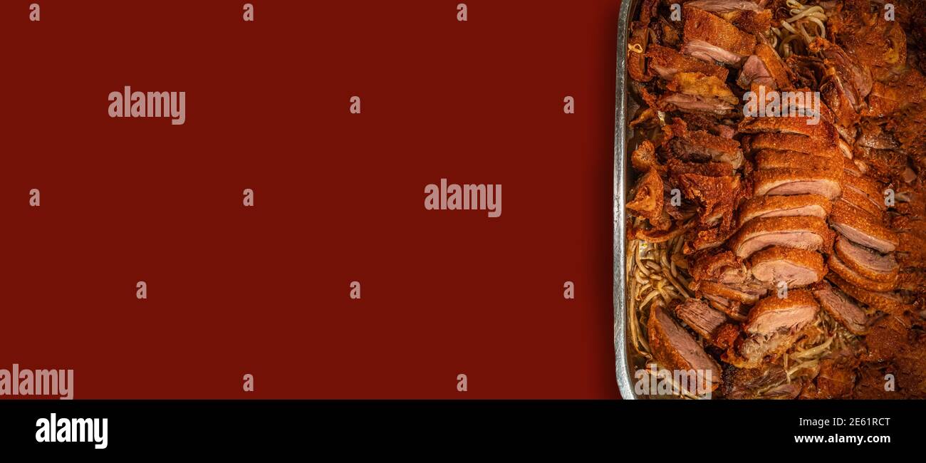 Banner with Asian fast food, fried duck with Chinese noodles in the big ...