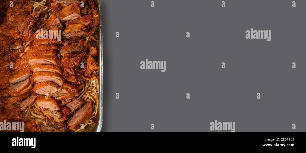 Banner with Asian fast food, fried duck with Chinese noodles in the big ...