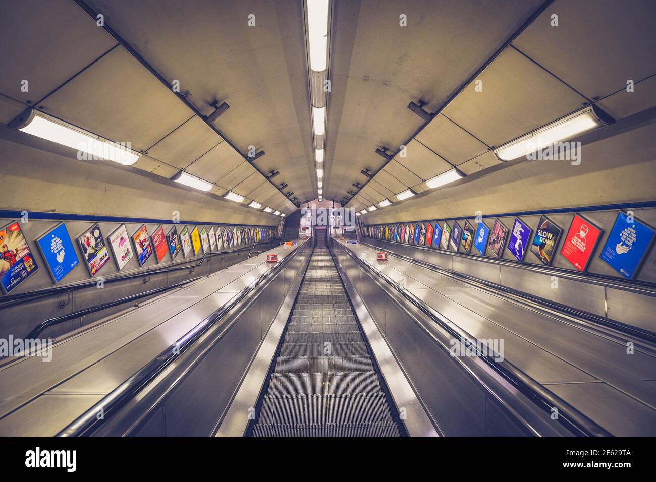 London/UK - 1/28/21 - A deserted escalator on London's underground tube ...