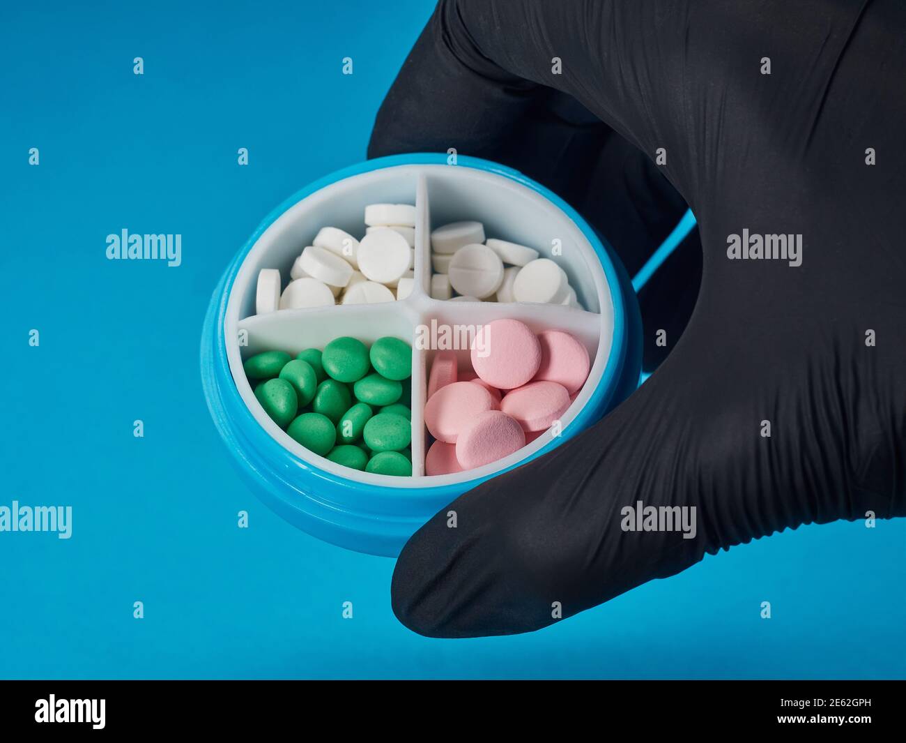 Blue pill box on a textured blue background. High quality photo Stock ...