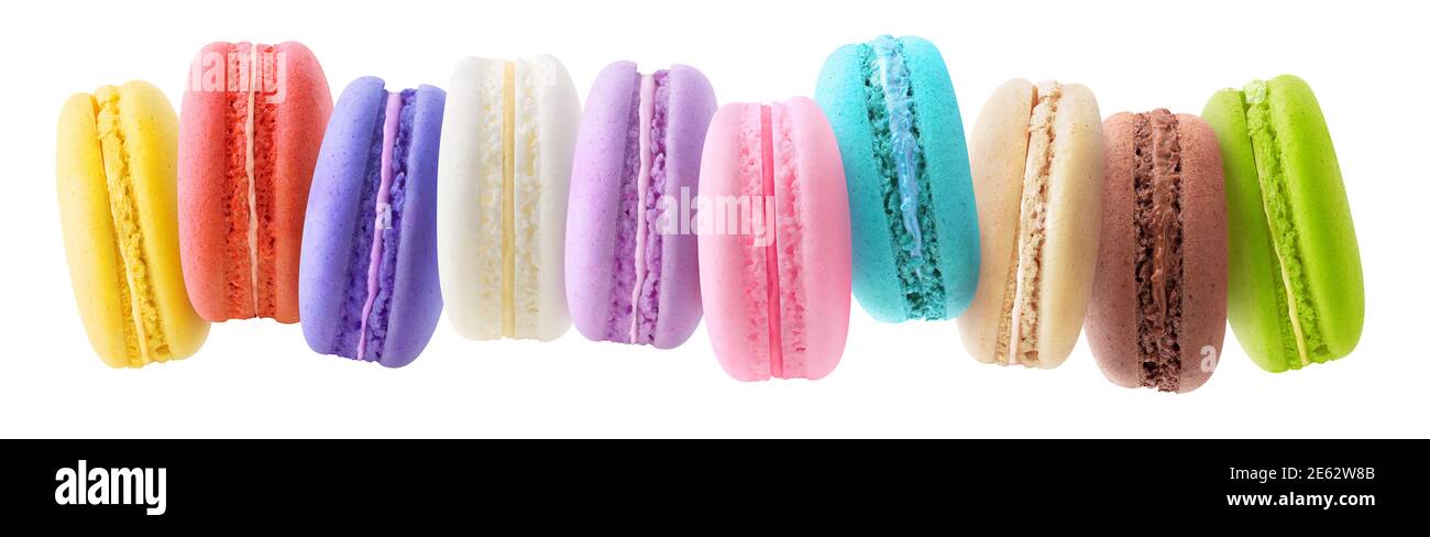 Macaroons of different colors in a row isolated on white background ...