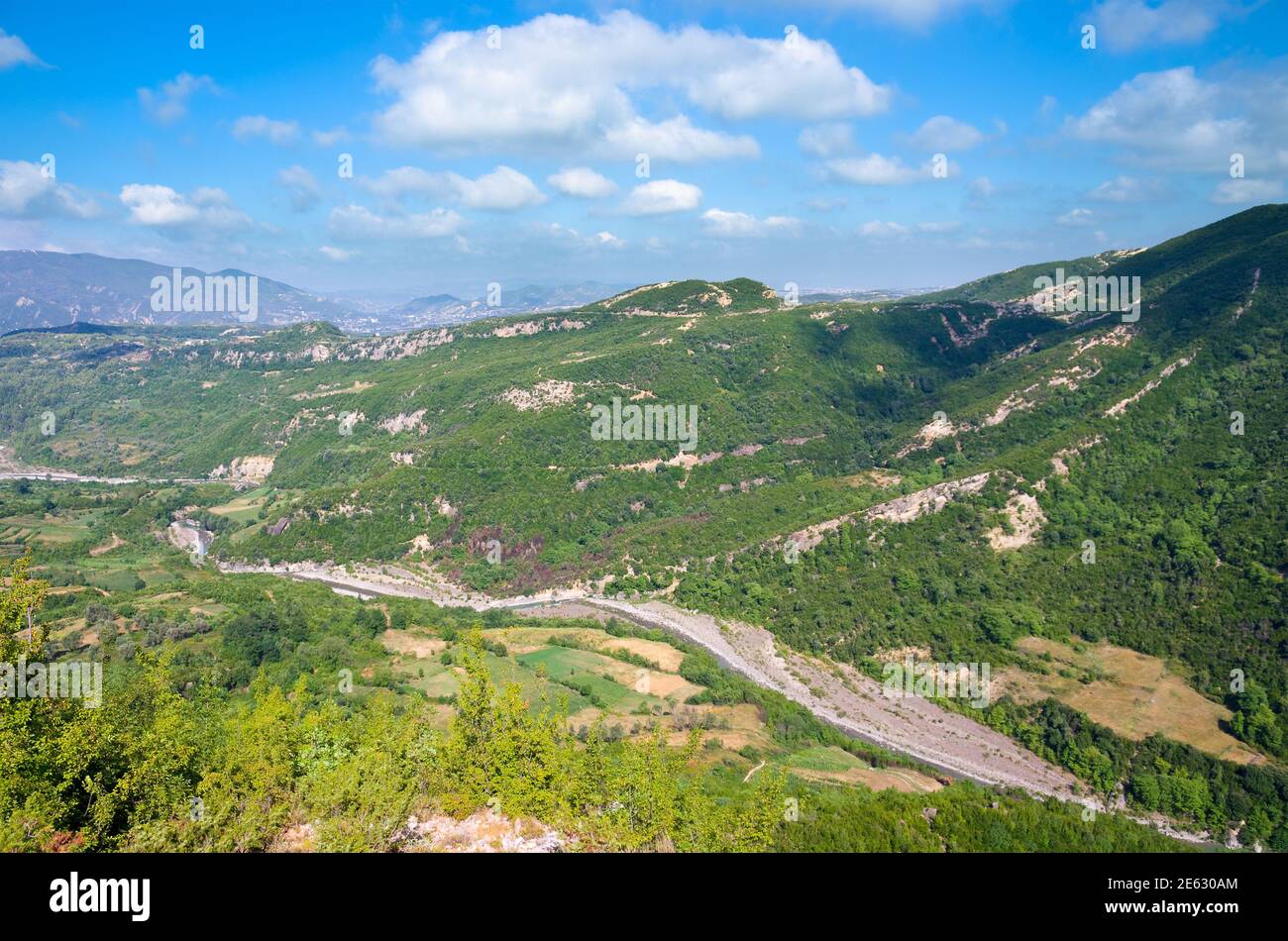 high view of the Valley Erzen River from footpath to the Pellumbas Cave ...