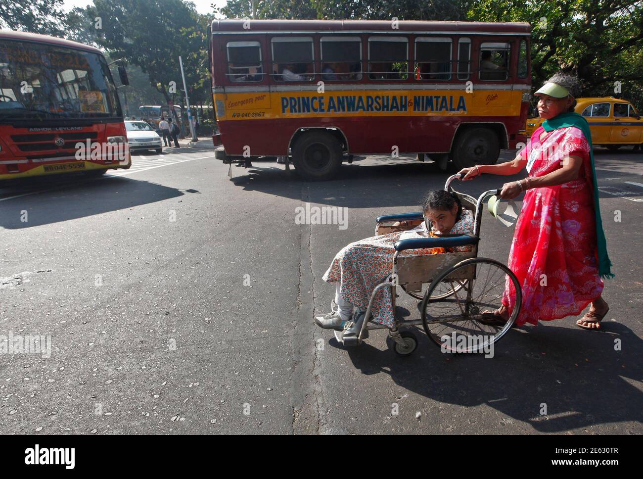 Indian woman in a wheelchair hi-res stock photography and images - Alamy
