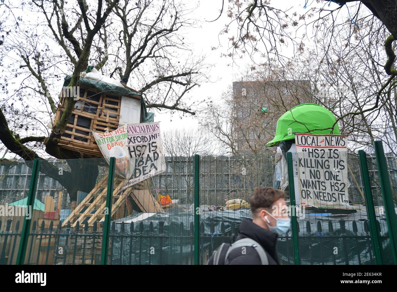 High fences are erected around the Euston Square Gardens during the ...