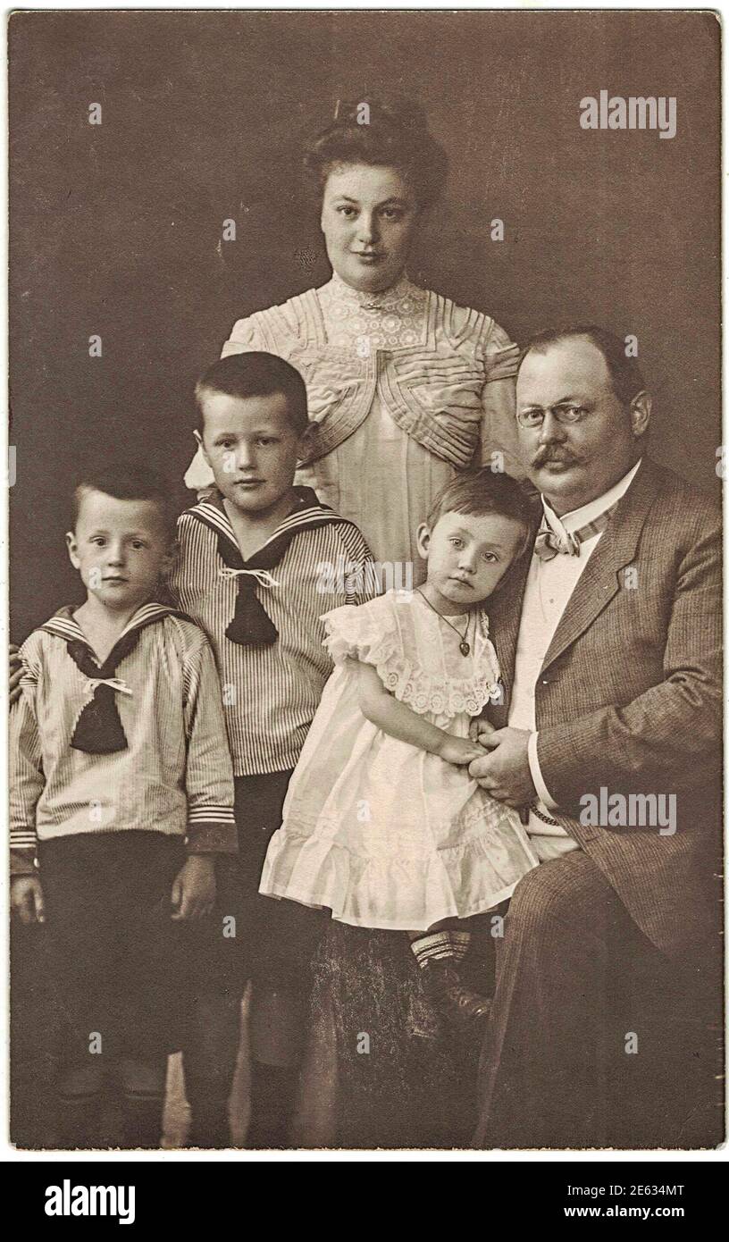 GERMANY - 1908: The vintage photo shows family. Two boys wear sailor ...