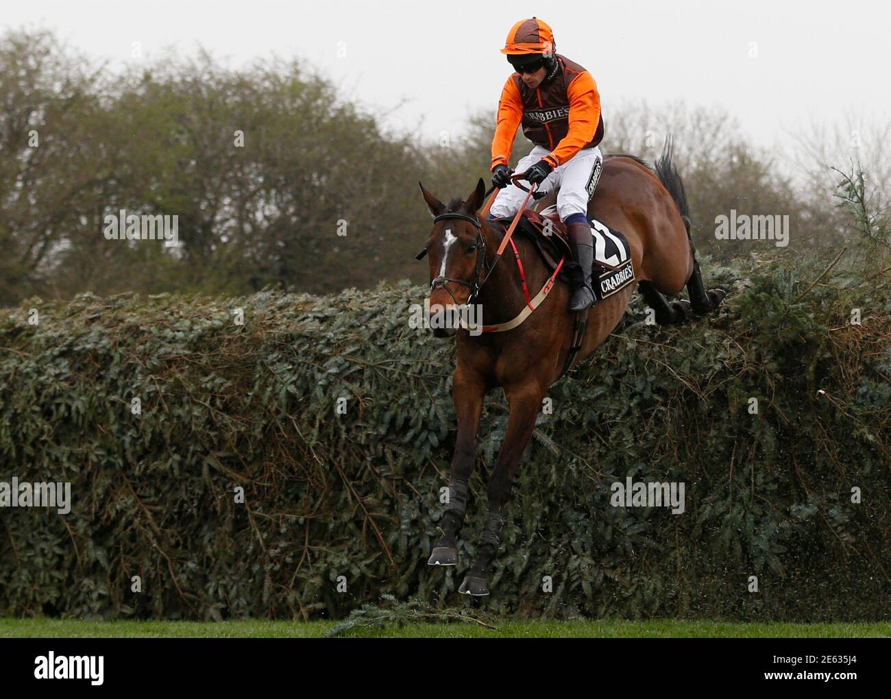 Jumps the open ditch at the grand national hi-res stock photography and ...