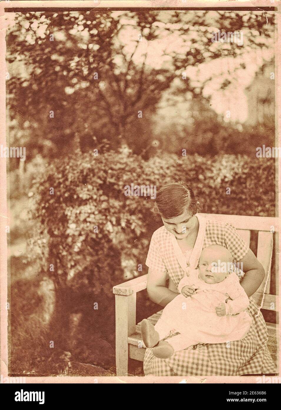 GERMANY - CIRCA 1940: The vintage photo shows mum and her baby child ...