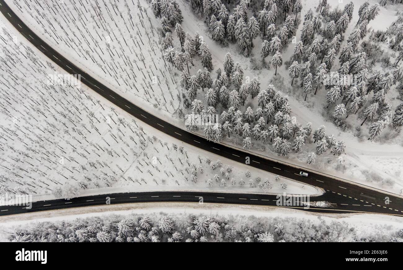 Aerial view of snowy winter landscape of Winterberg with winding roads ...