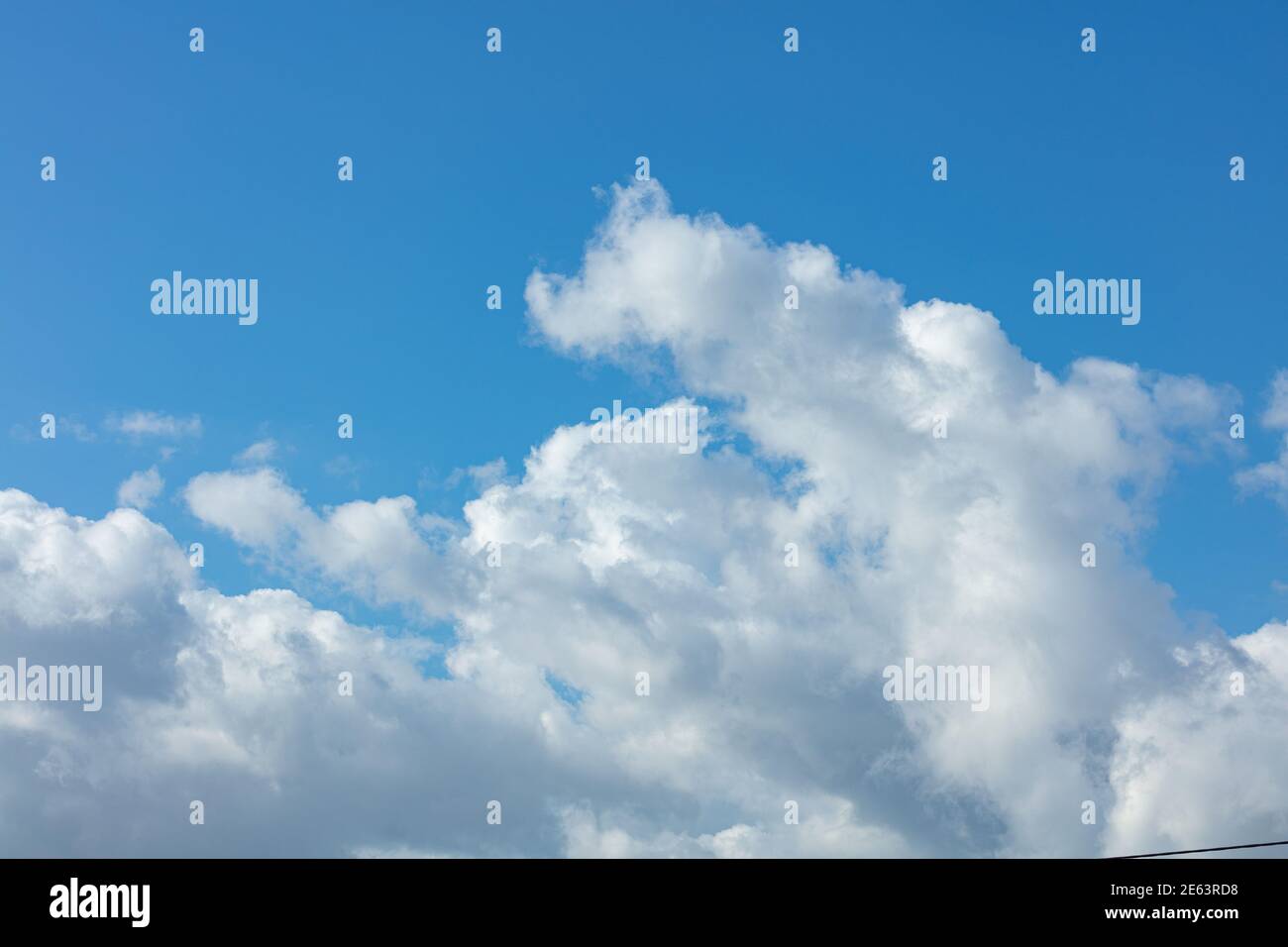 Beautiful blue sky with a big white cloud Stock Photo - Alamy