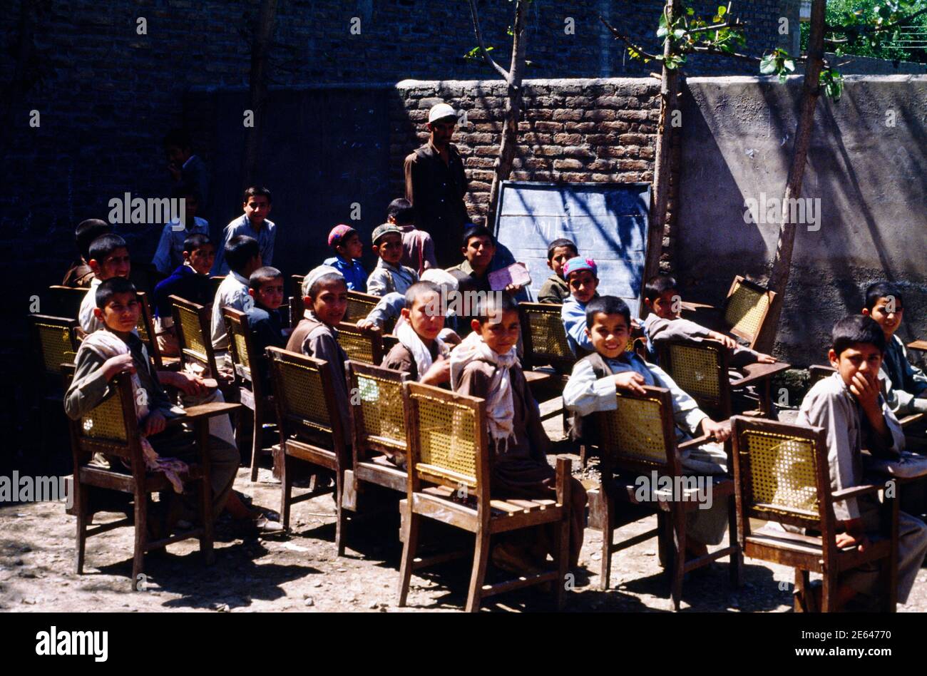 North Pakistan Swat/Chitral Schoolchildren at lesson at Open Air School ...