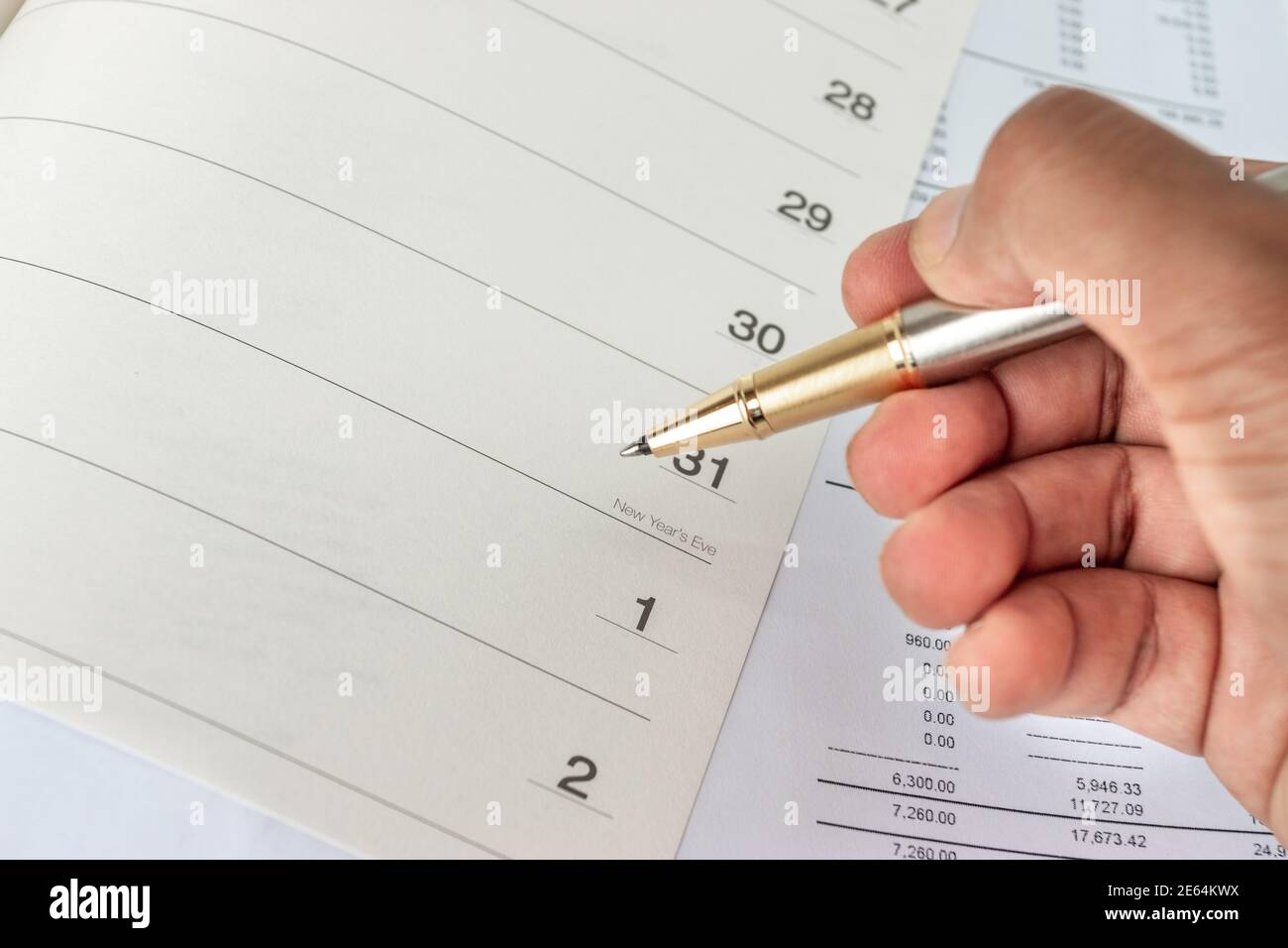 The calendar in the notebook on the desk Stock Photo - Alamy