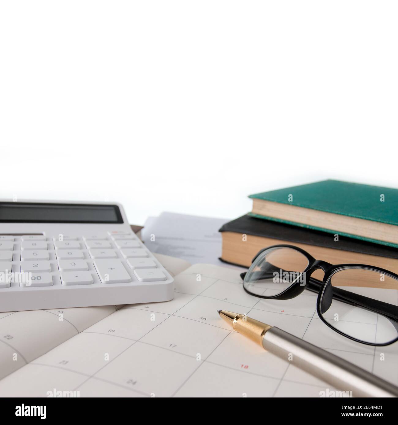 The calendar in the notebook on white background Stock Photo - Alamy