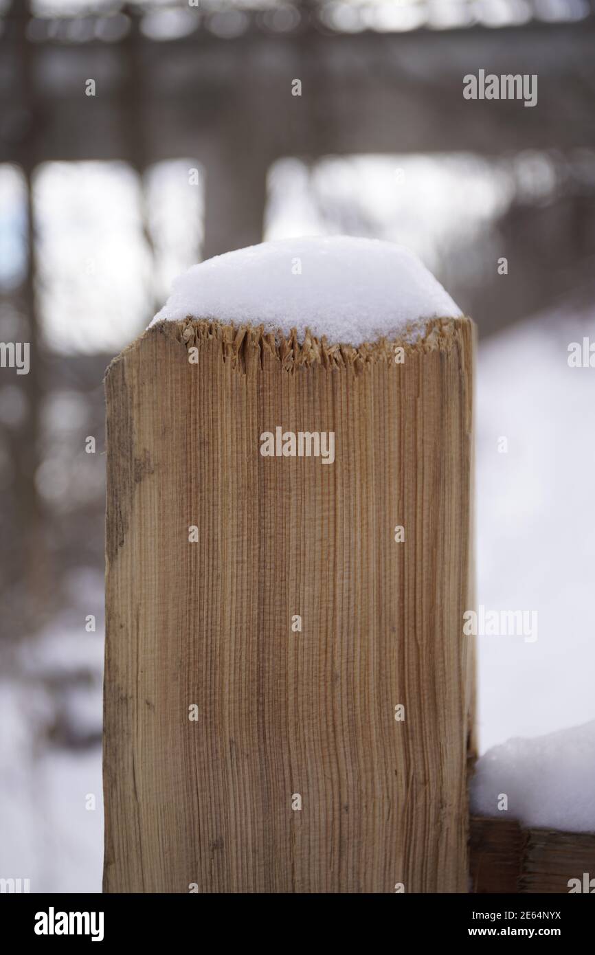 The snow on the wood fence Stock Photo - Alamy
