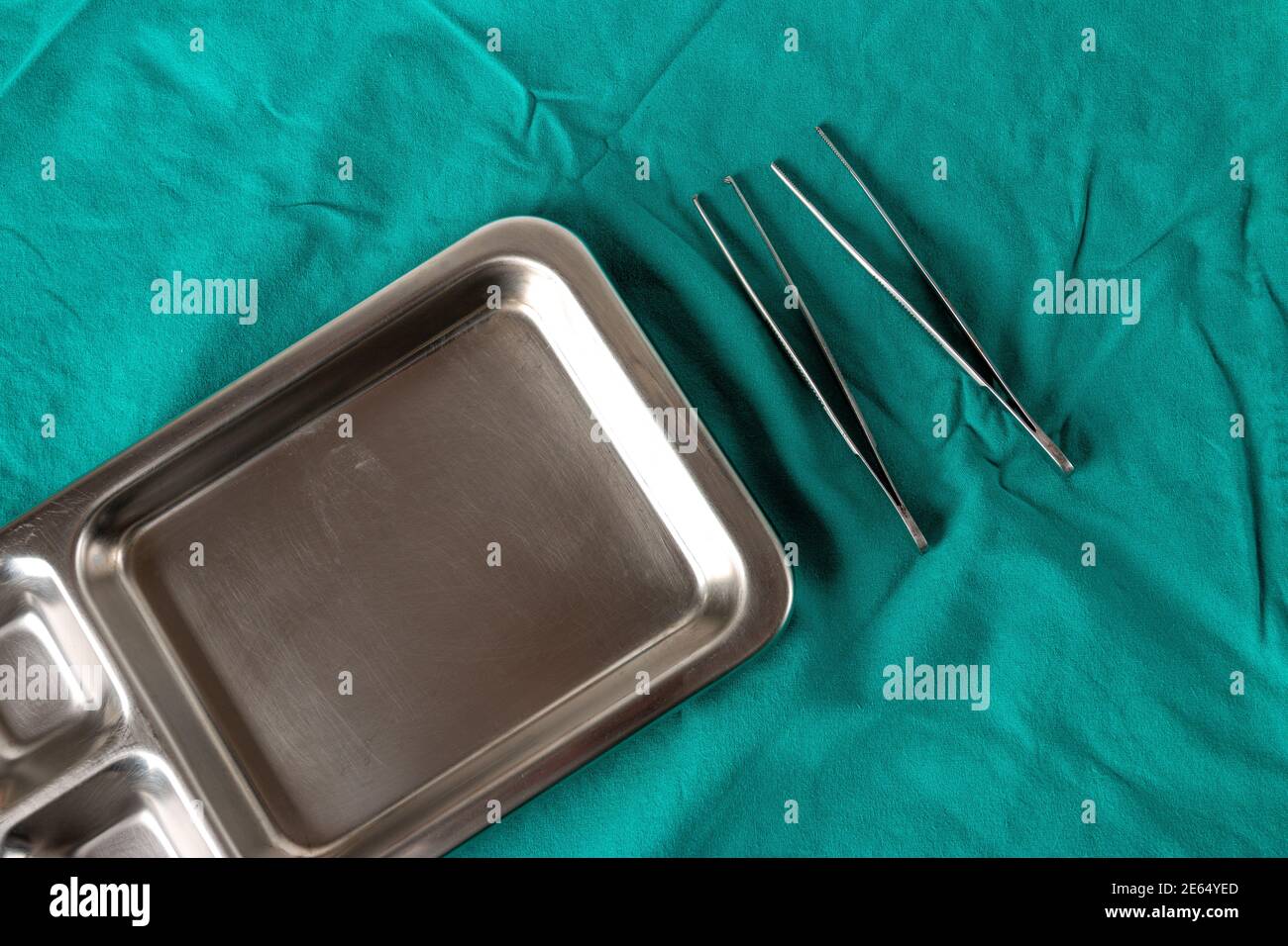 Medical equipment on a green cloth in the operating room, medical ...