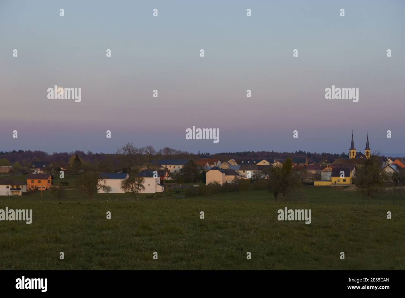 Moon over village hi-res stock photography and images - Alamy
