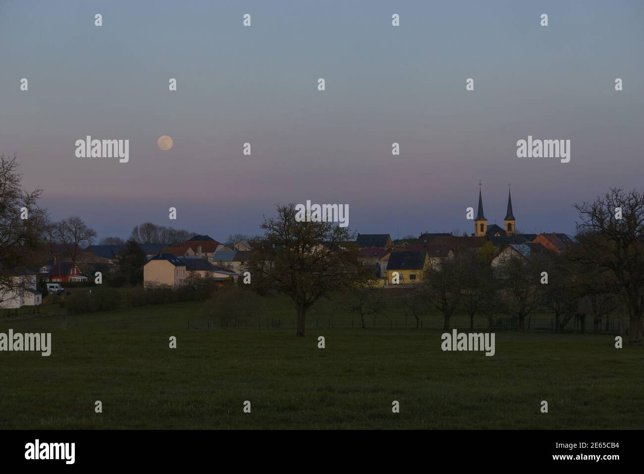 Moon over village hi-res stock photography and images - Alamy