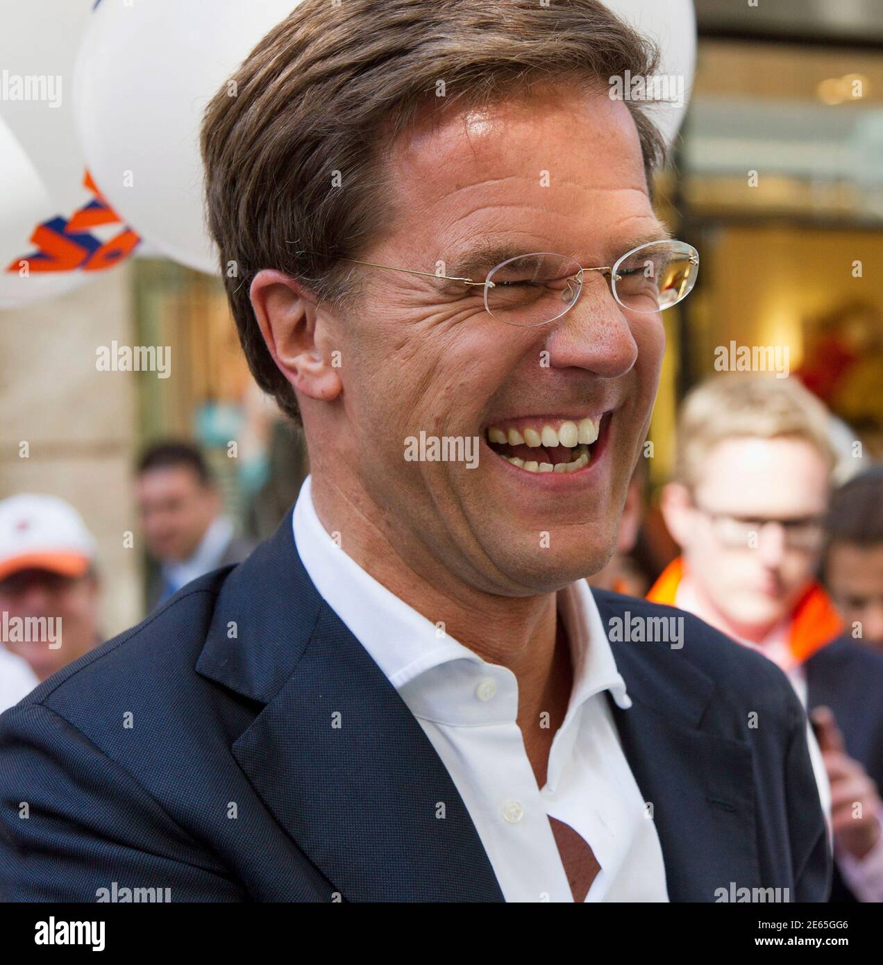 Handing out flyers hi-res stock photography and images - Alamy