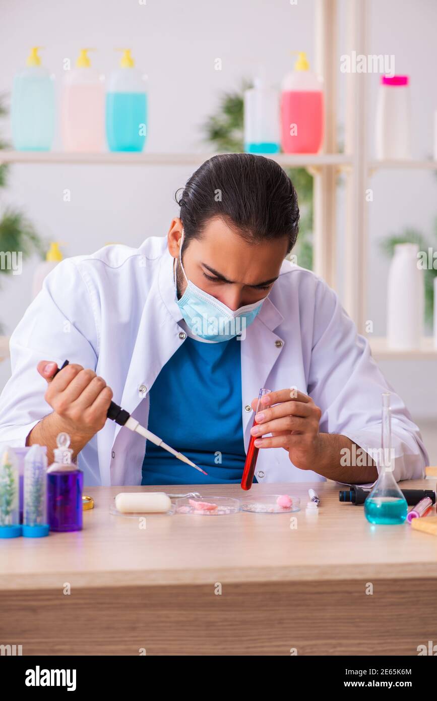 Young chemist testing soap in the lab Stock Photo - Alamy