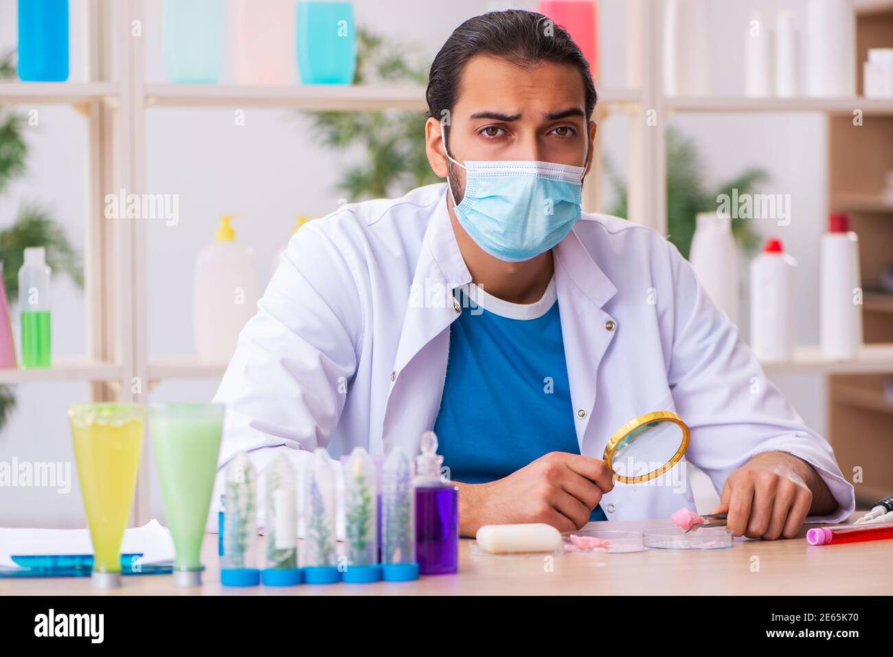 Young chemist testing soap in the lab Stock Photo - Alamy
