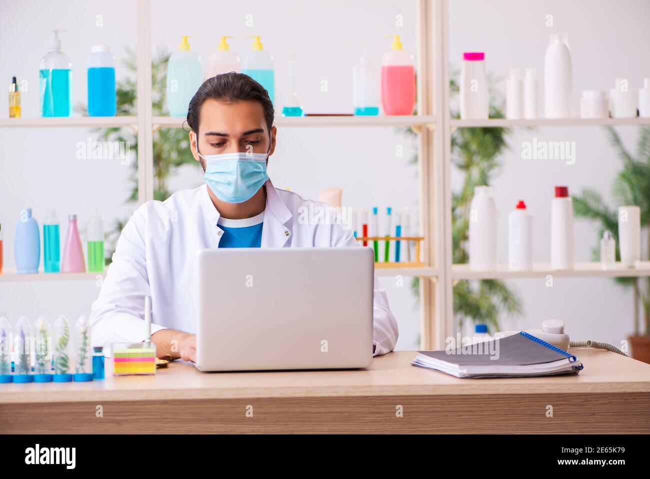 Young chemist testing soap in the lab Stock Photo - Alamy