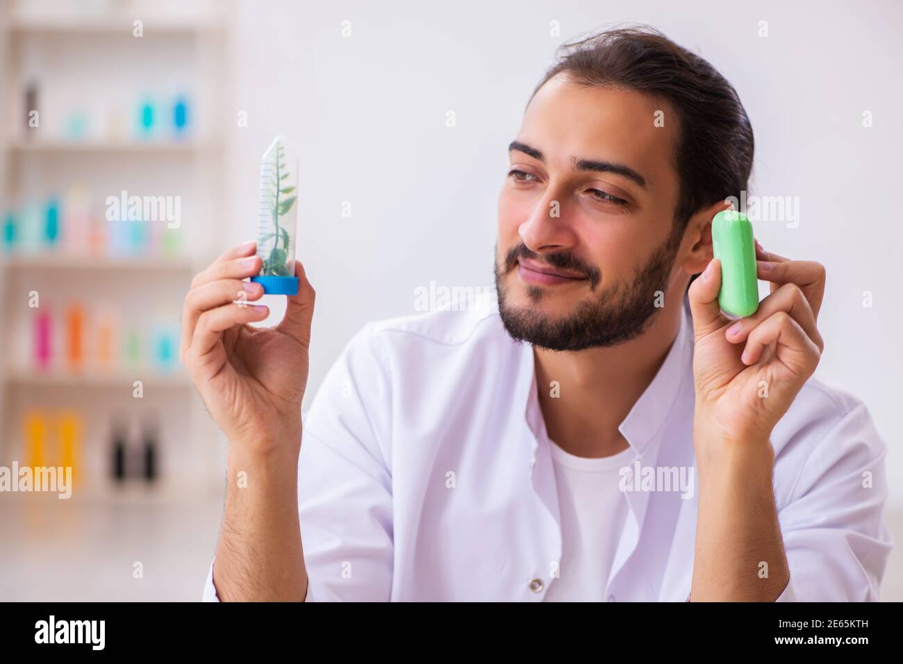 Young chemist testing soap in the lab Stock Photo - Alamy