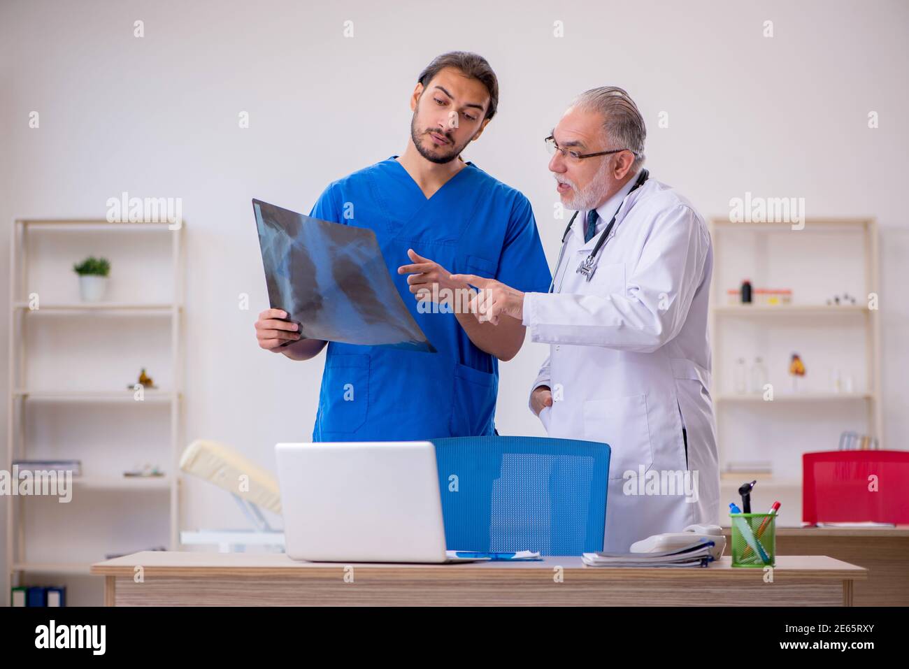 Two doctors working in the hospital Stock Photo - Alamy