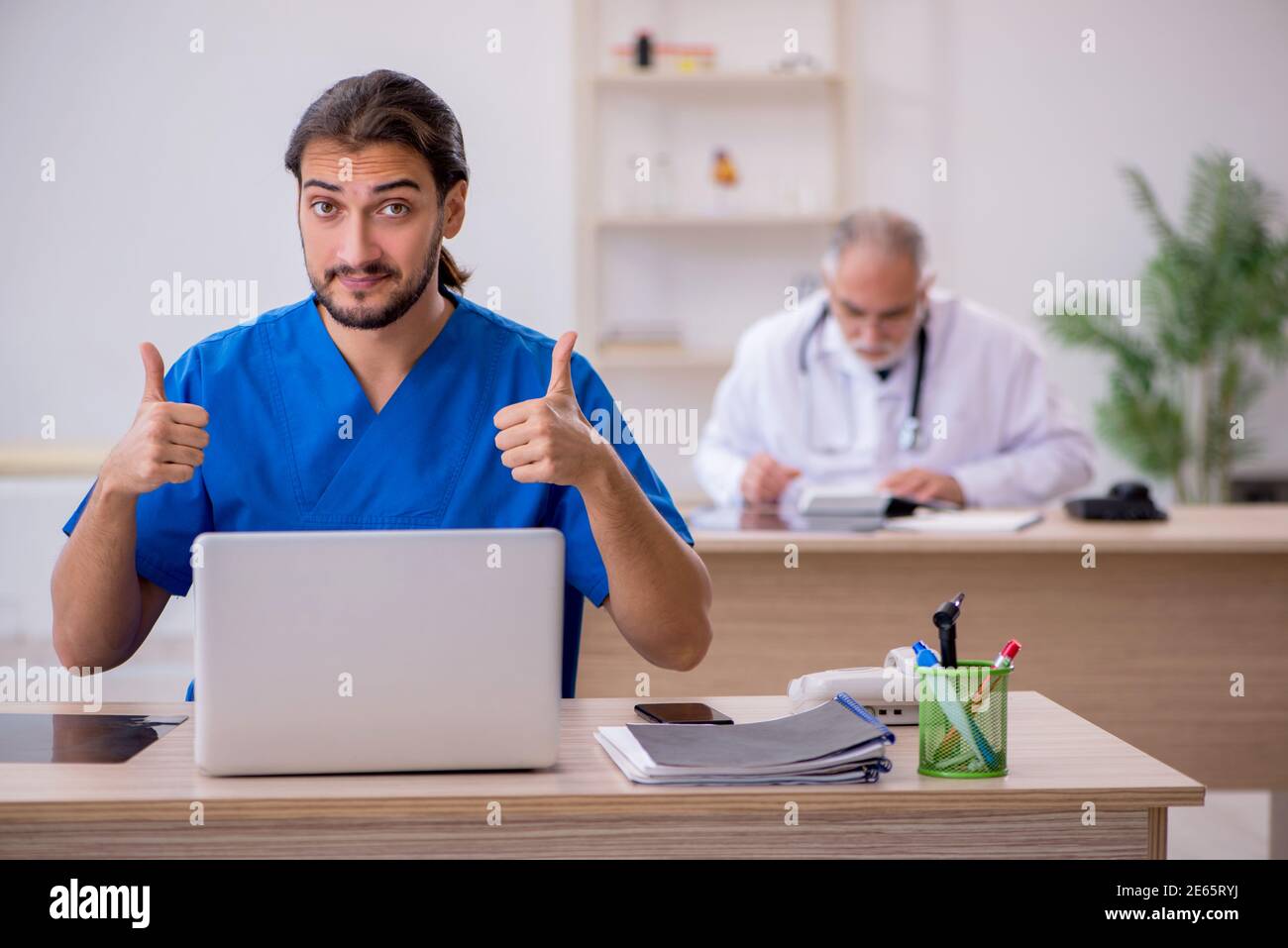 Two doctors working in the hospital Stock Photo - Alamy