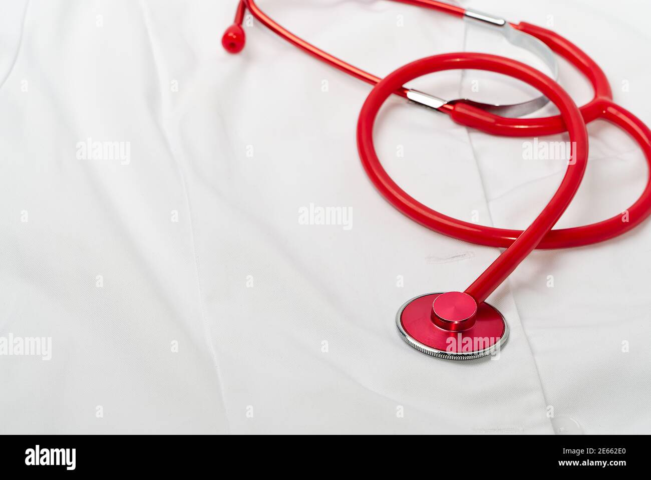 Red stethoscope on white background, close up Stock Photo - Alamy