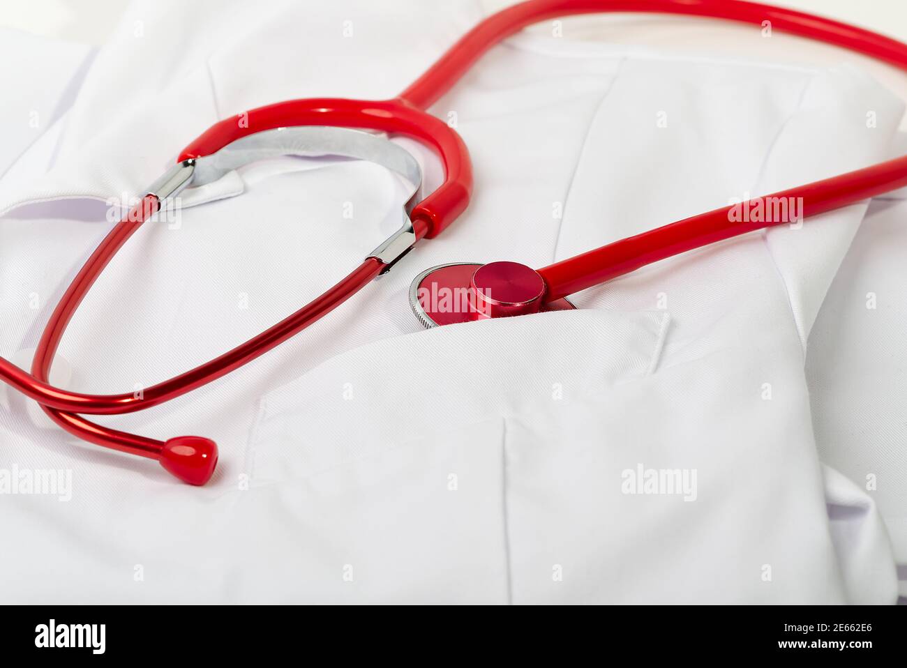 Red stethoscope on white background, close up Stock Photo - Alamy