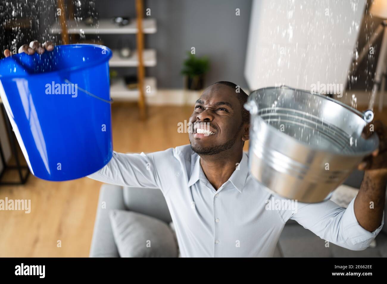 Water dripping bucket hi-res stock photography and images - Alamy