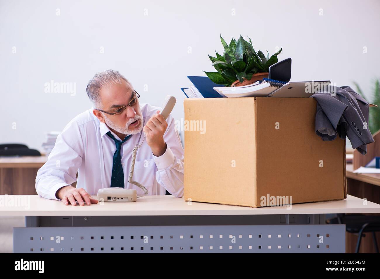 Old employee being fired from his work Stock Photo - Alamy