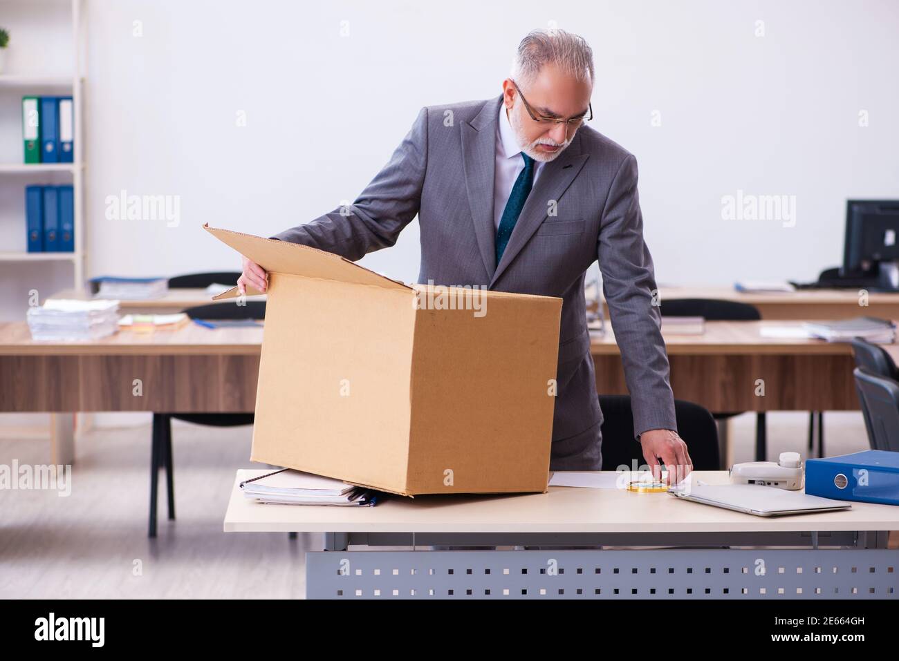 Old employee being fired hi-res stock photography and images - Alamy
