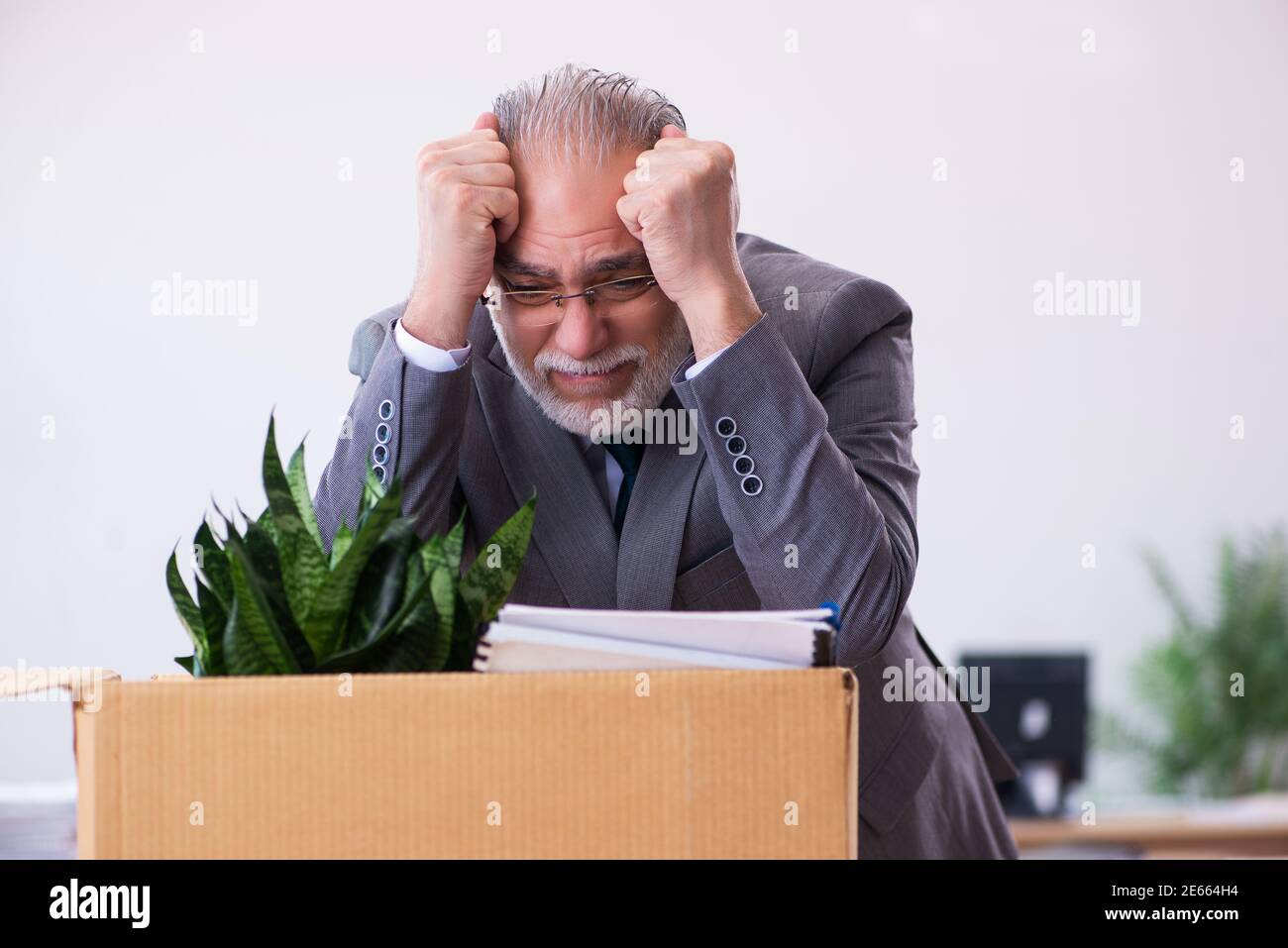 Old employee being fired from his work Stock Photo - Alamy