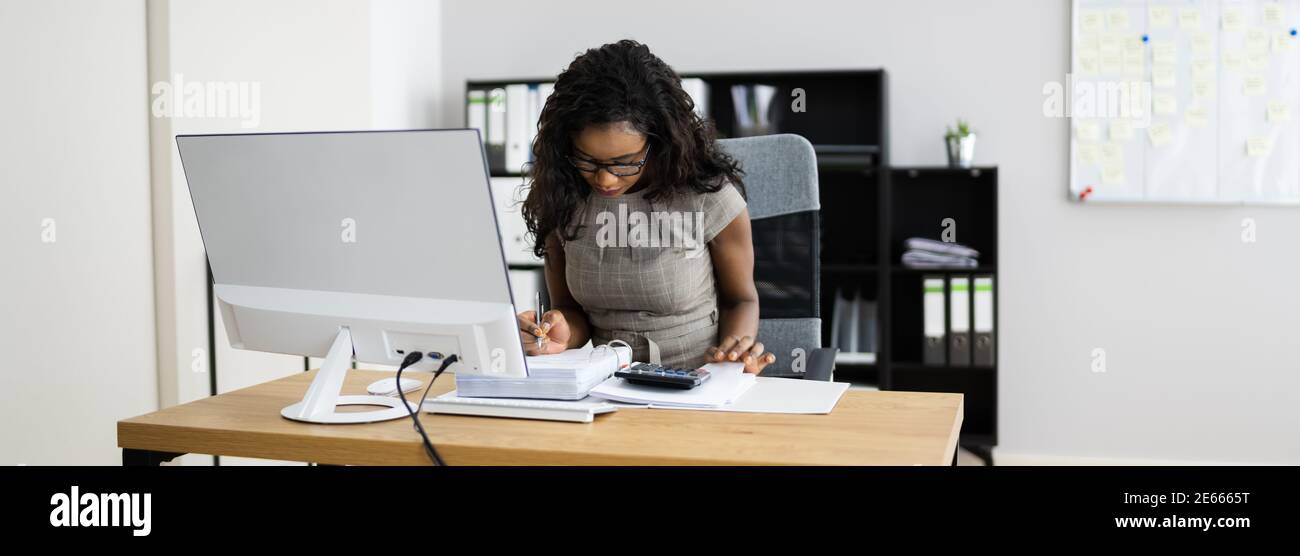African American Accounting Advisor Woman Doing Taxes Stock Photo - Alamy