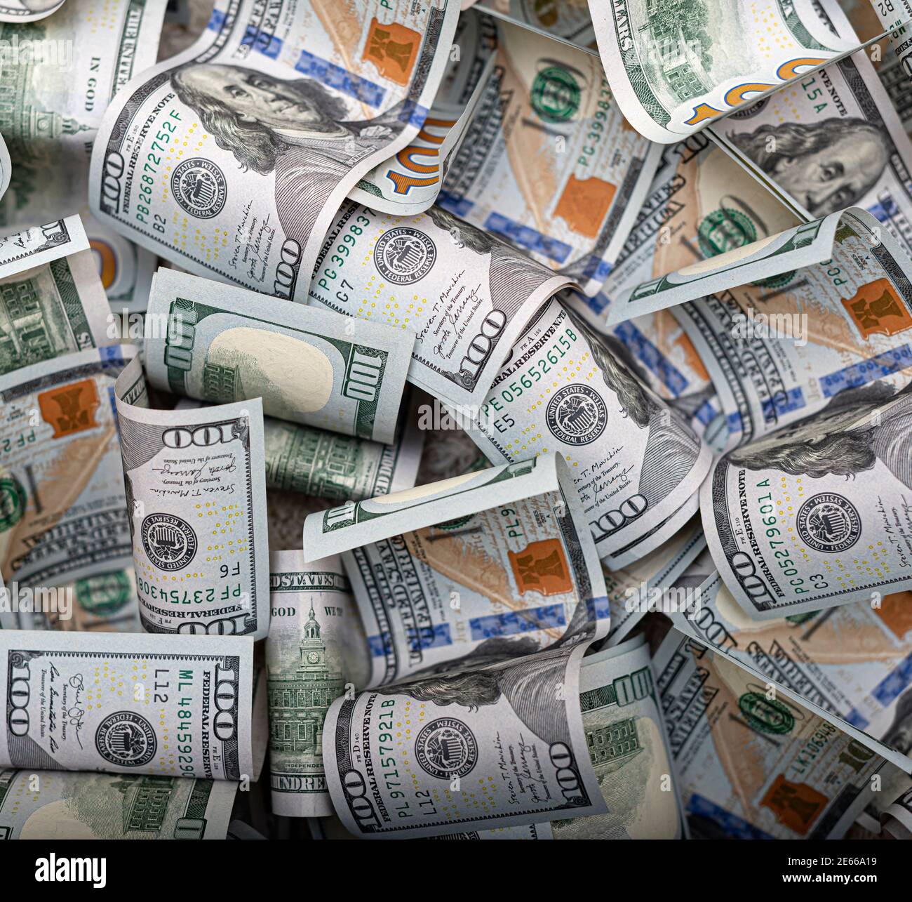 Hundred dollar rolled banknotes as background Stock Photo - Alamy