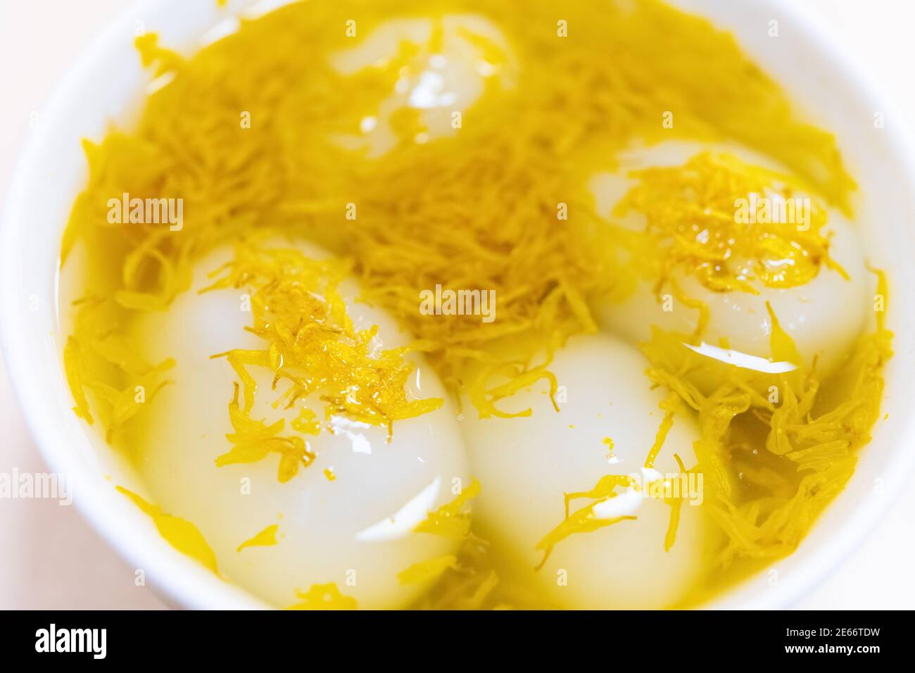 Chinese tangyuan or glutinous rice balls with chrysanthemum petal Stock ...