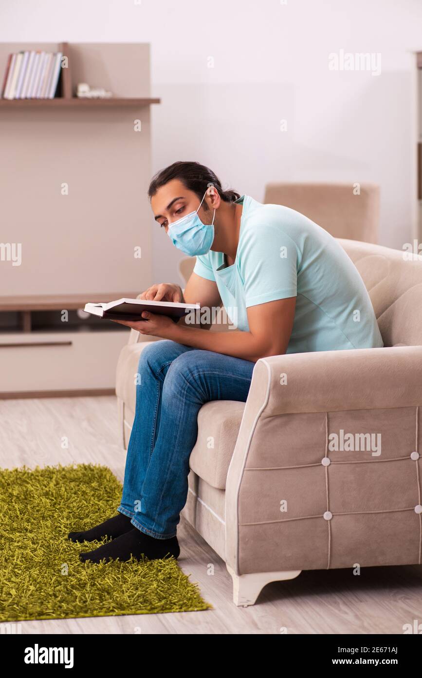 Young student studying at home during pandemic Stock Photo - Alamy