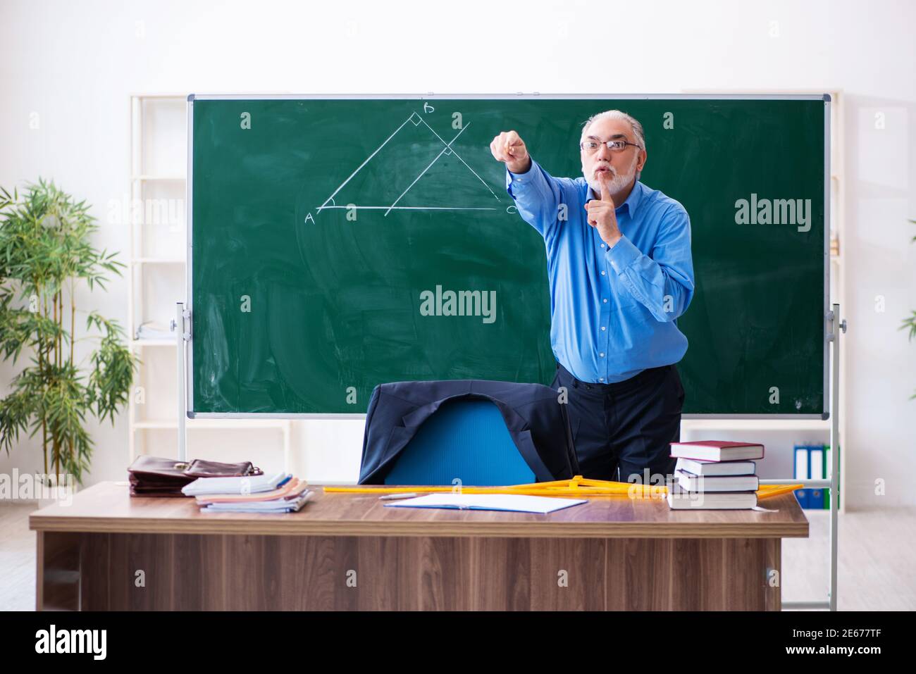 Elderly math teacher hi-res stock photography and images - Alamy