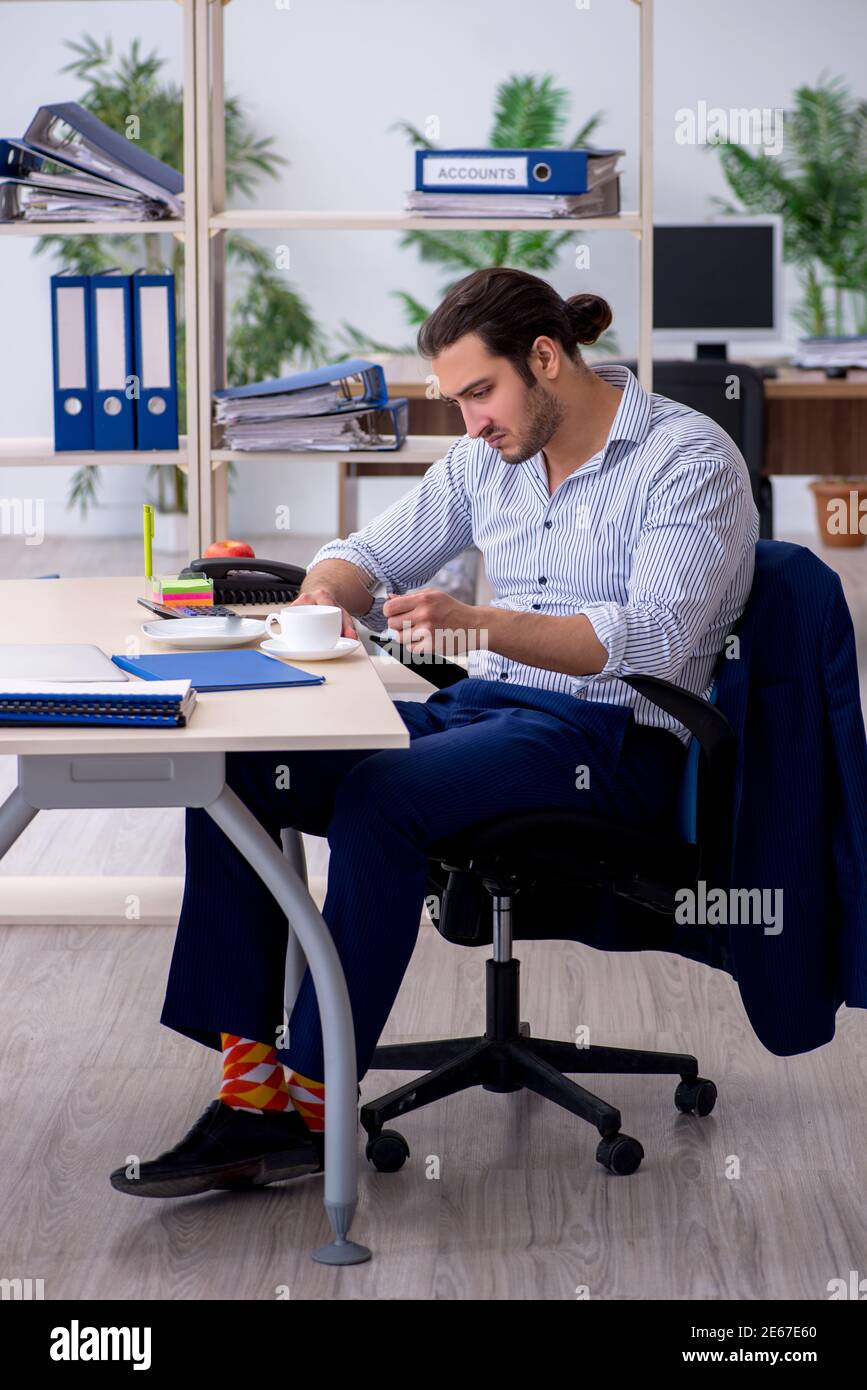 Hungry employee waiting for food at workplace Stock Photo - Alamy