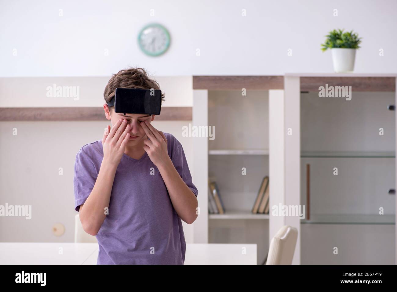 Schoolboy wearing virtual glasses hi-res stock photography and images ...