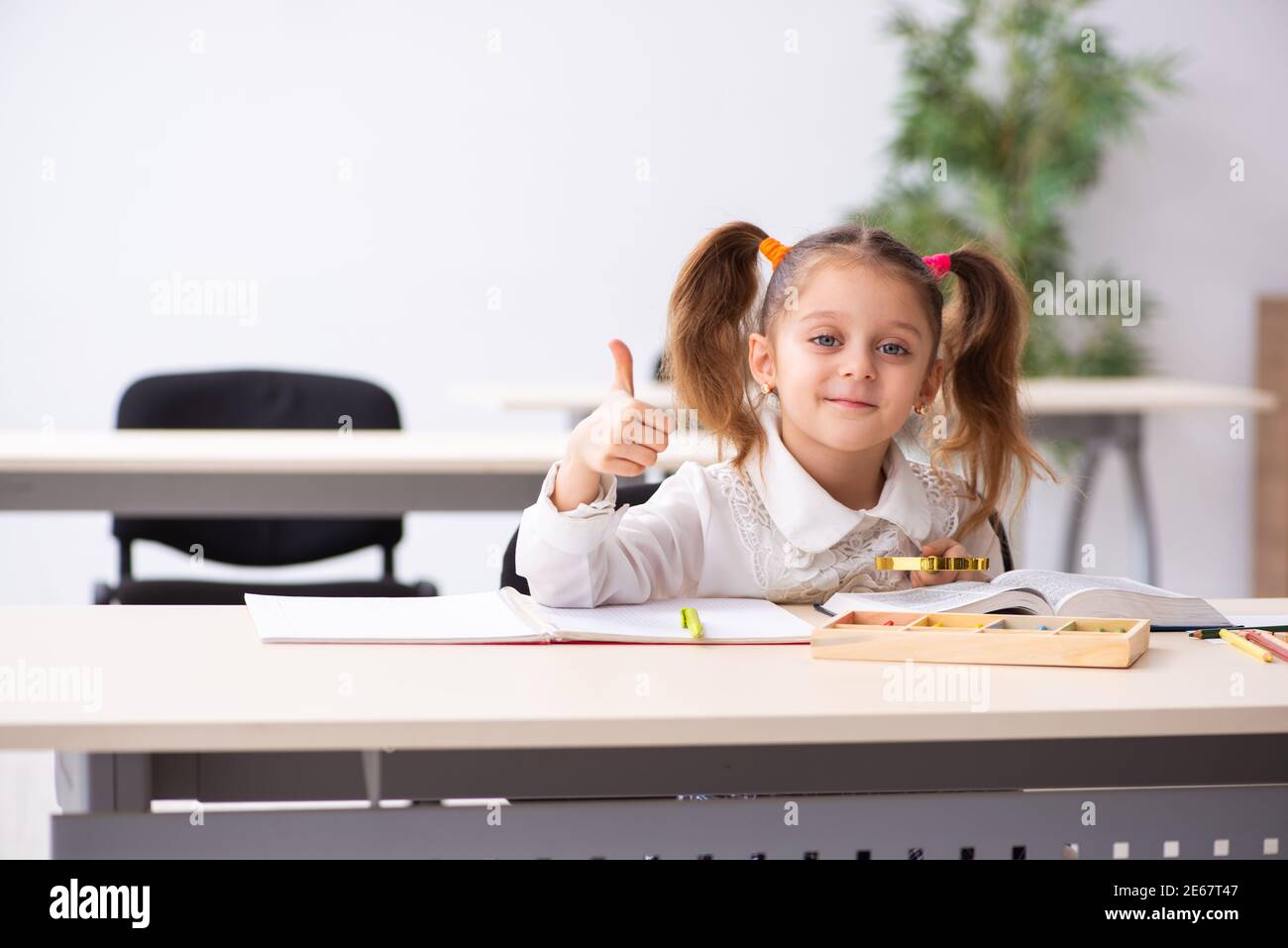 Small girl in the early development concept Stock Photo - Alamy