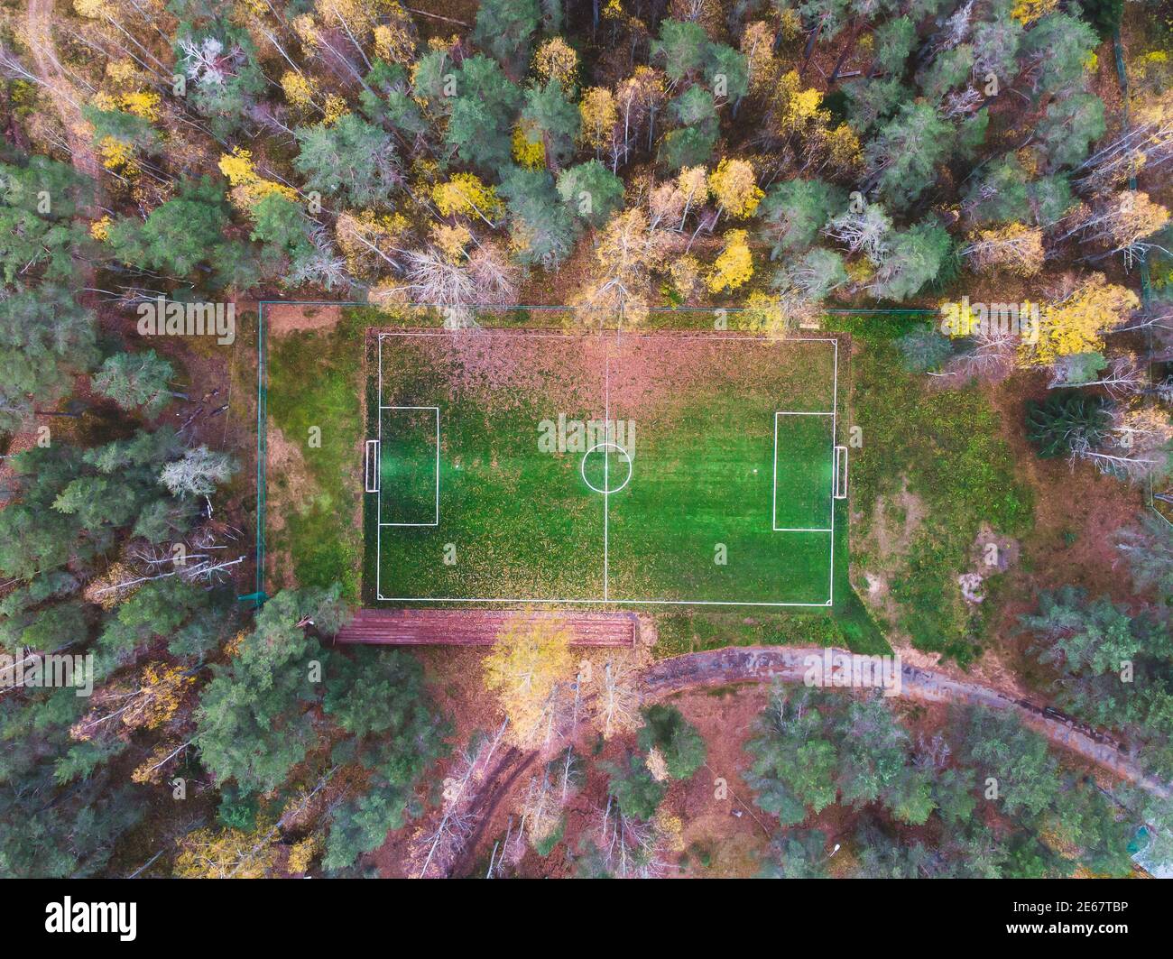 Aerial drone view of football soccer pitch field, green grass fall ...