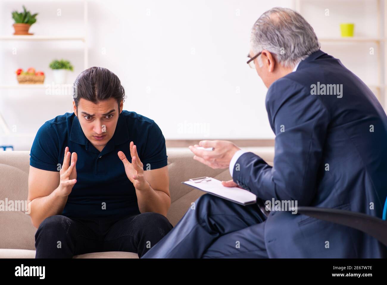 Angry psychiatric patient old hi-res stock photography and images - Alamy