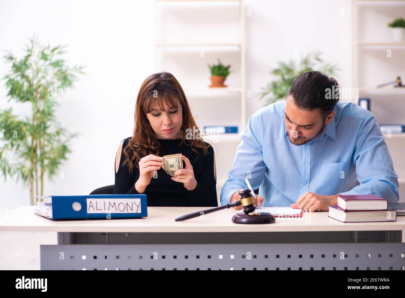 Couple divorcing in alimony concept Stock Photo - Alamy