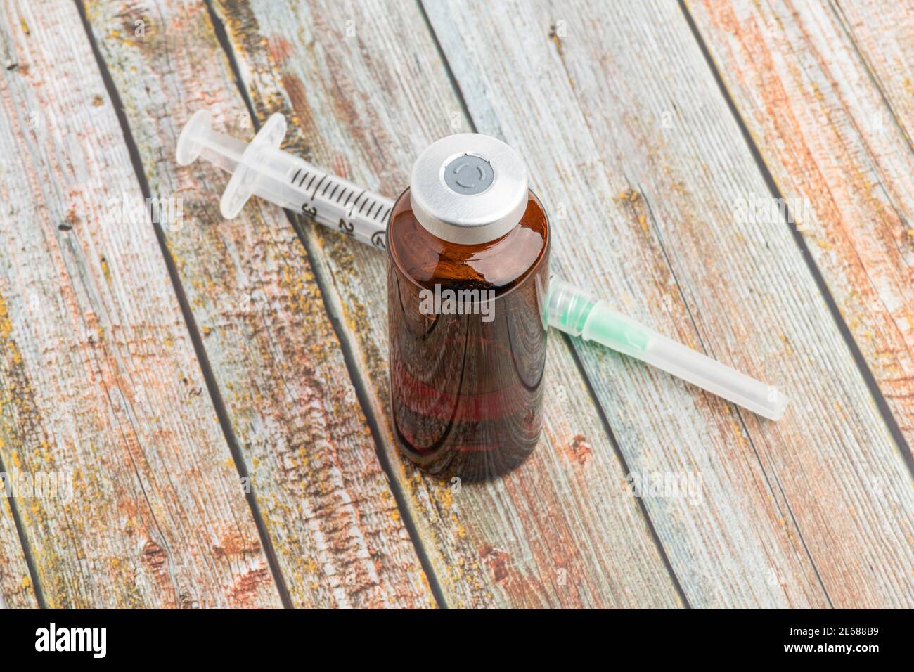 A close-up shot of a hygienic single-use plastic disposable syringe ...