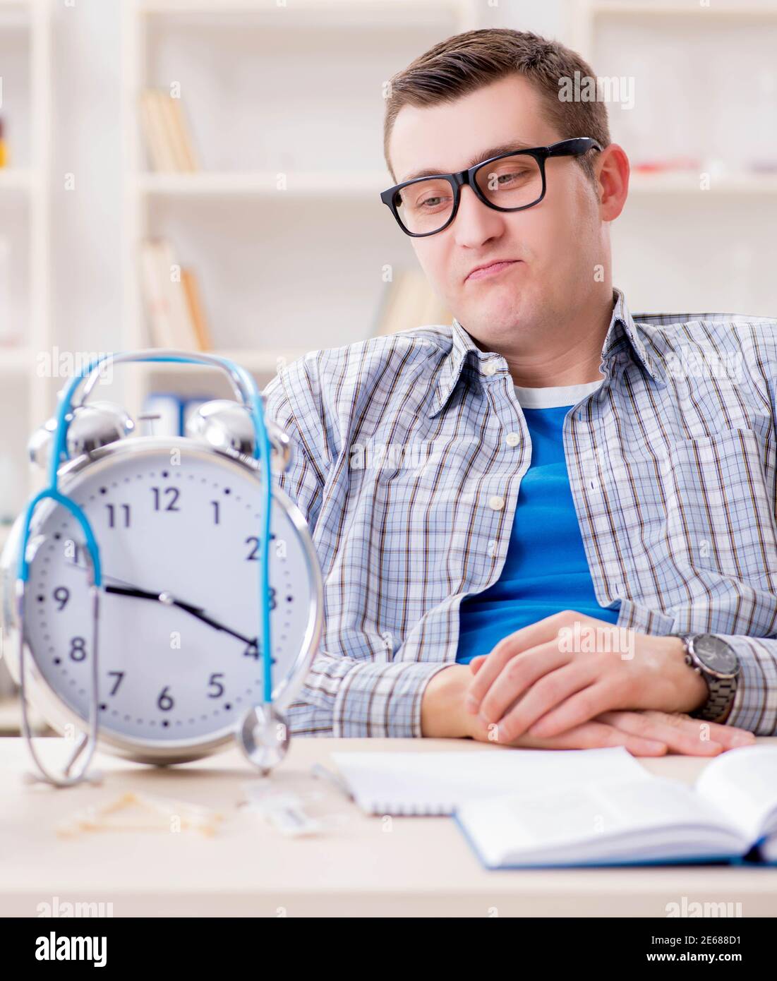 The medical student missing deadlines to complete assignment Stock ...