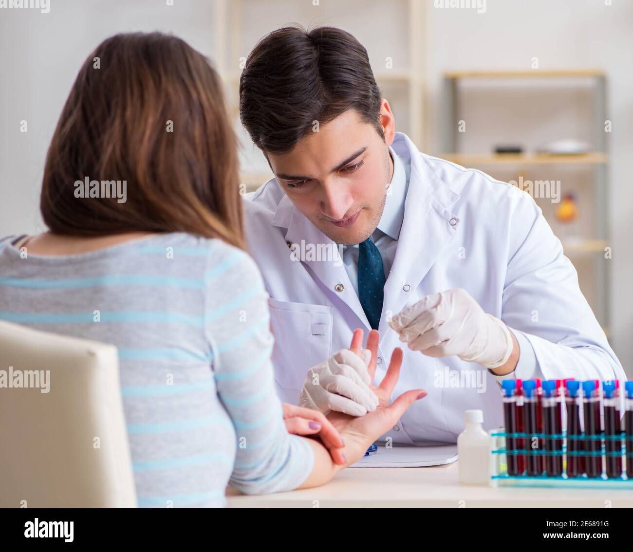 The patient during blood test sampling procedure taken for analysis ...